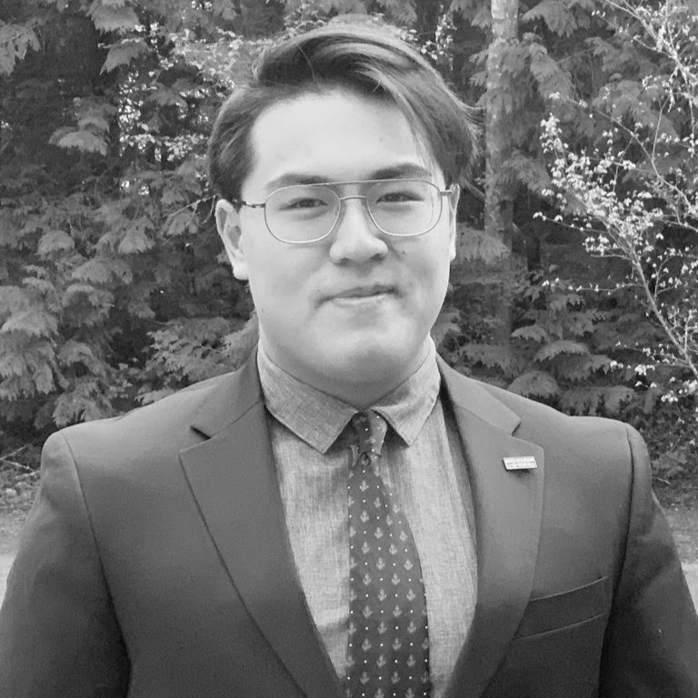 Professional headshot of Isaac Lau