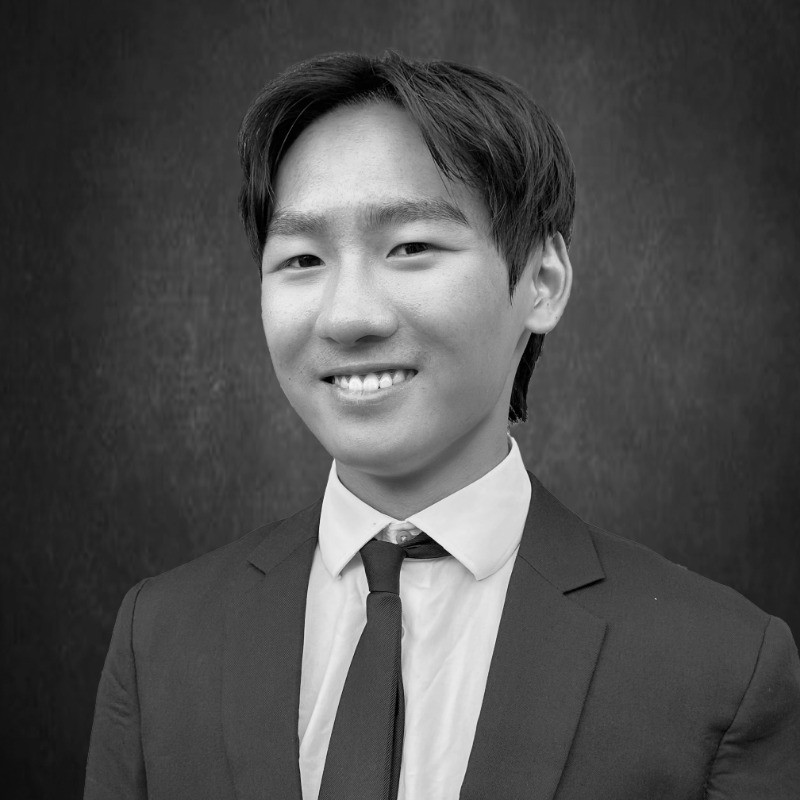 Professional headshot of Taylor Yi